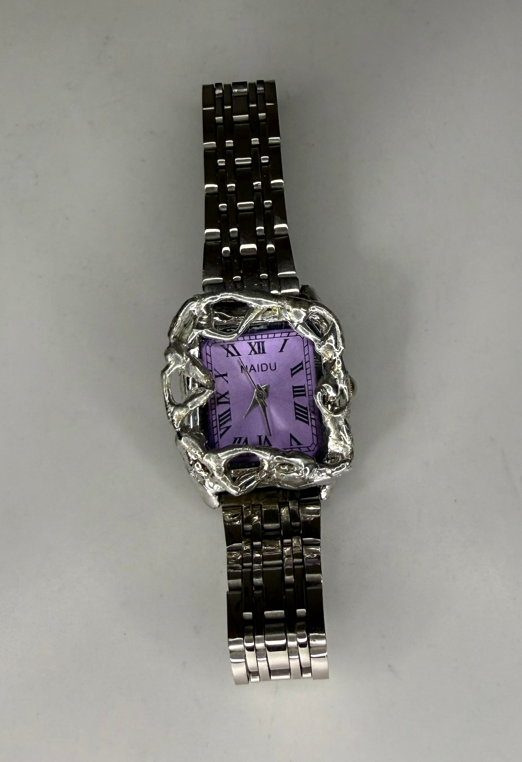 Purple wavy watch – Scorchedvalley